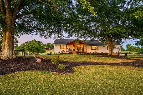 Beautiful renovated ranch home on 6+ acres with additional guest house