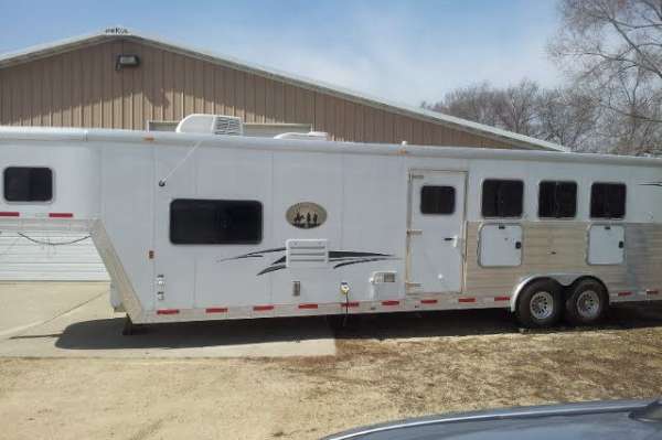 2011 Exiss 12' LQ 1 Owner Excellent Condition with Closets & Storage Galore
